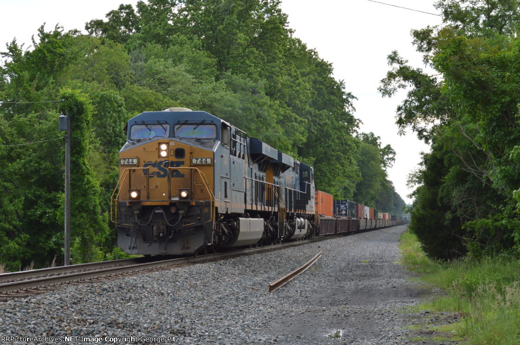 CSX 744 and train Q141